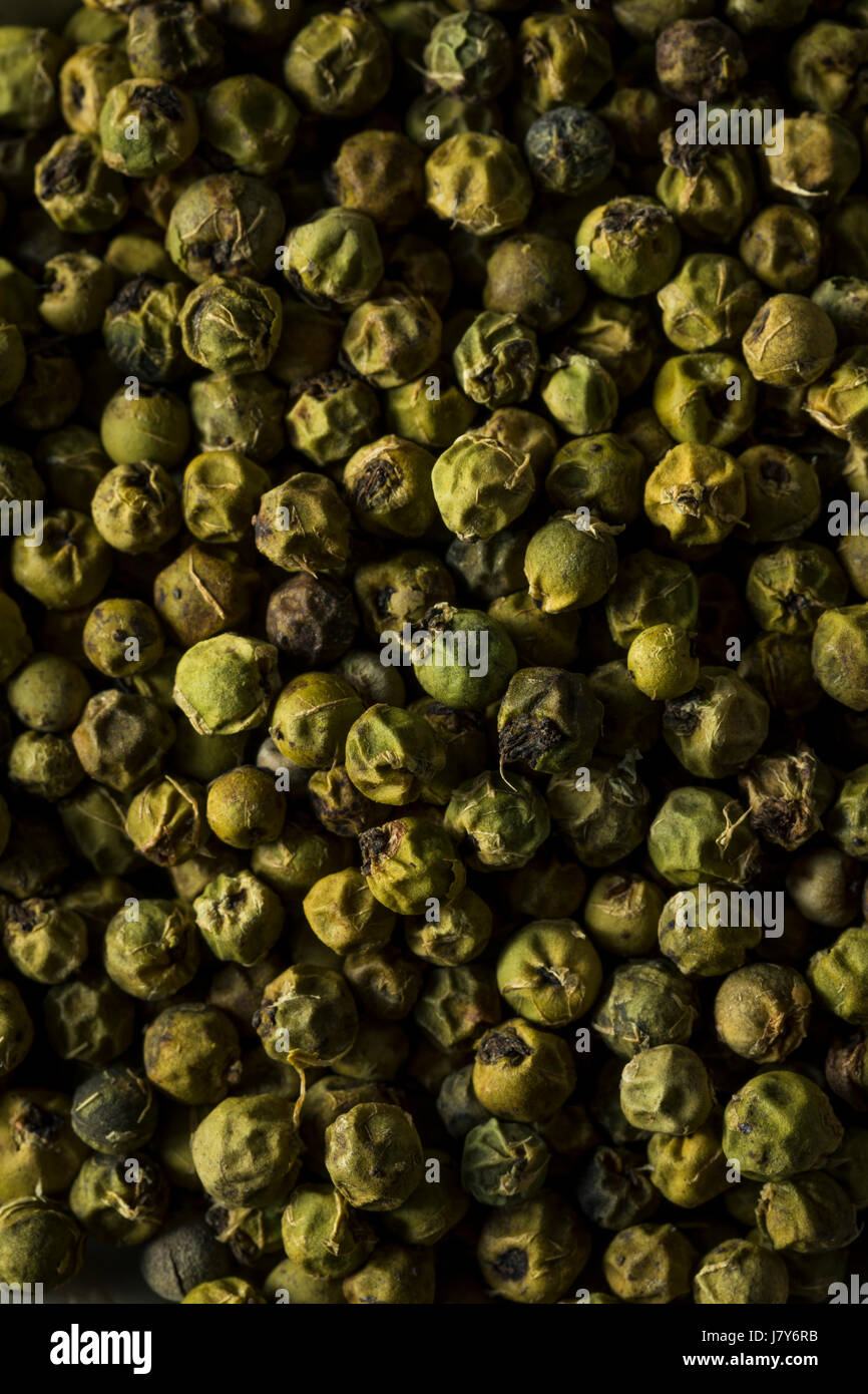 Raw Green Organic Peppercorns Ready to Cook With Stock Photo - Alamy