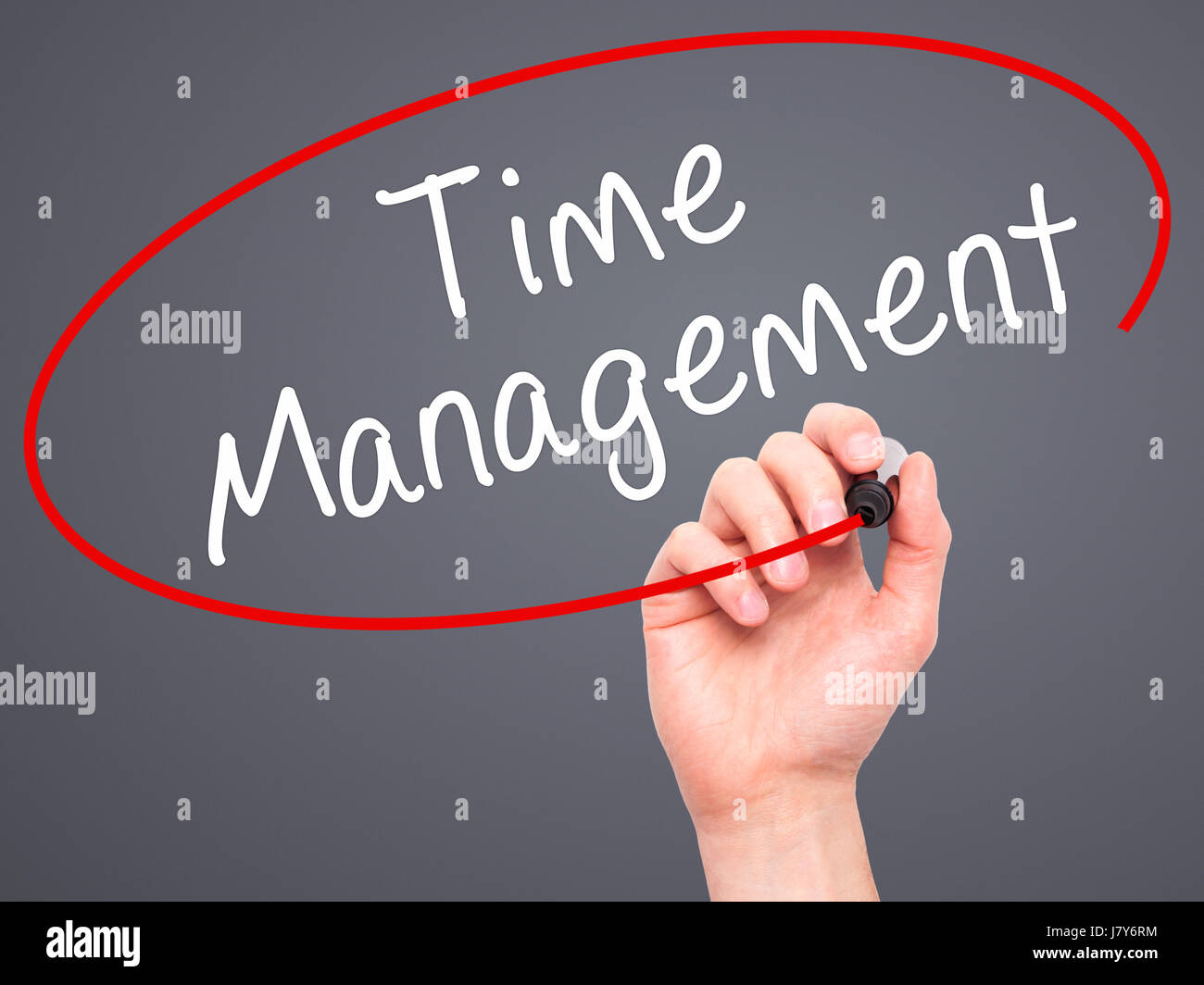 Man Hand writing Time Management with black marker on visual screen ...
