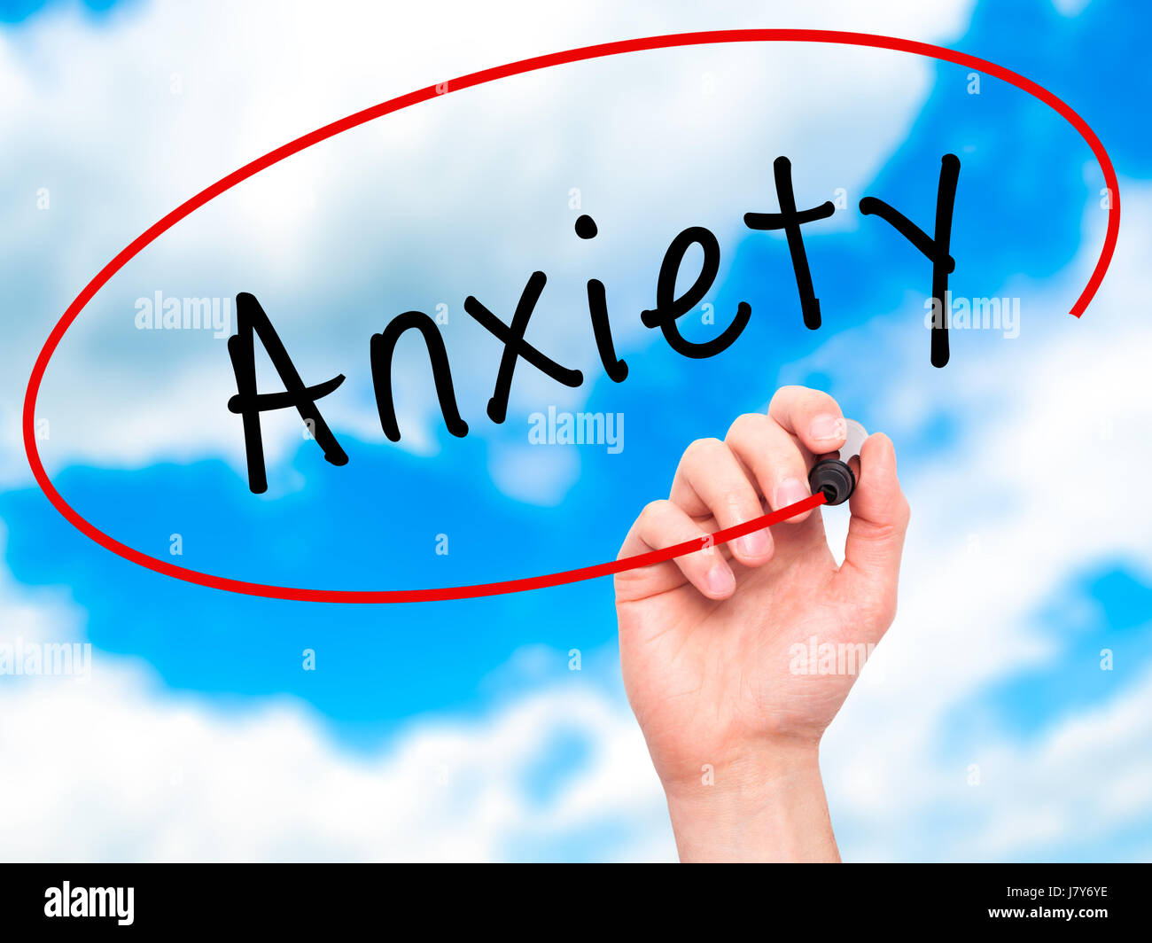 Man Hand writing Anxiety with black marker on visual screen. Isolated ...