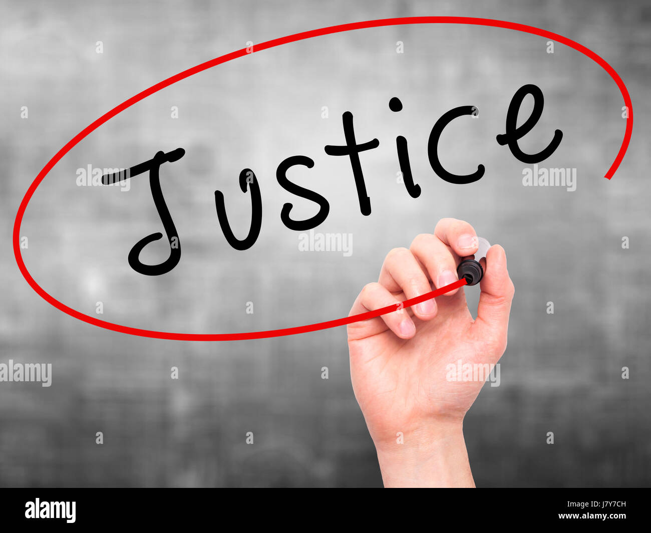 Man Hand writing Justice with black marker on visual screen. Isolated ...