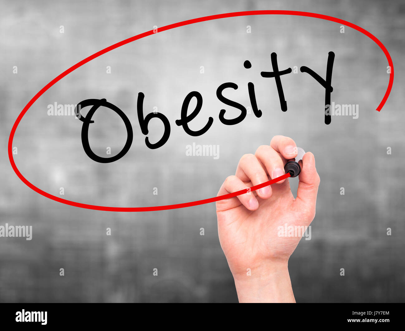 Man Hand writing Obesity with black marker on visual screen. Isolated ...