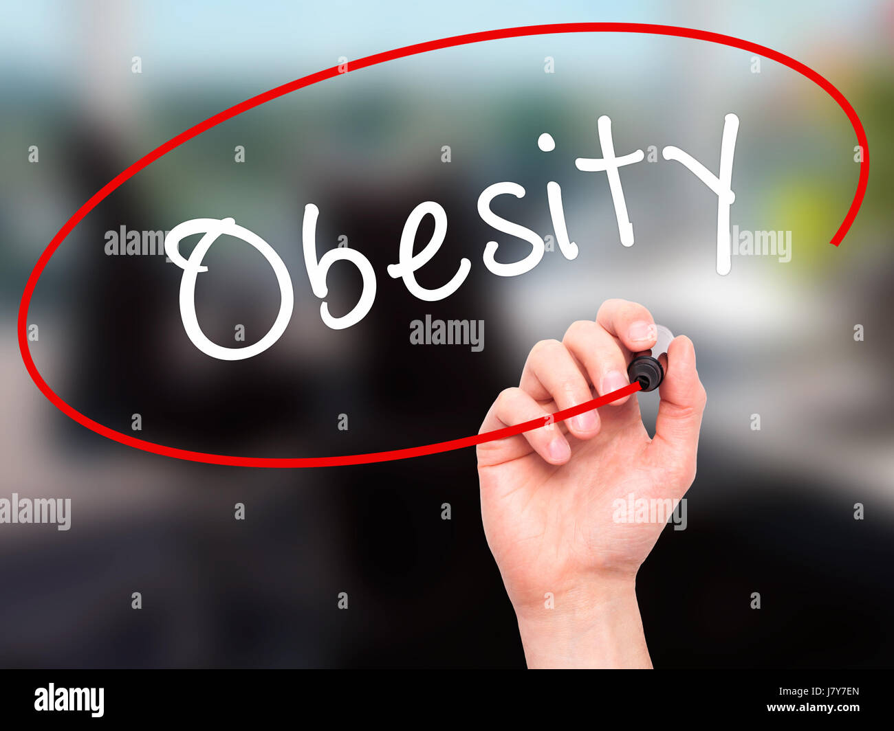 Man Hand writing Obesity with black marker on visual screen. Isolated ...