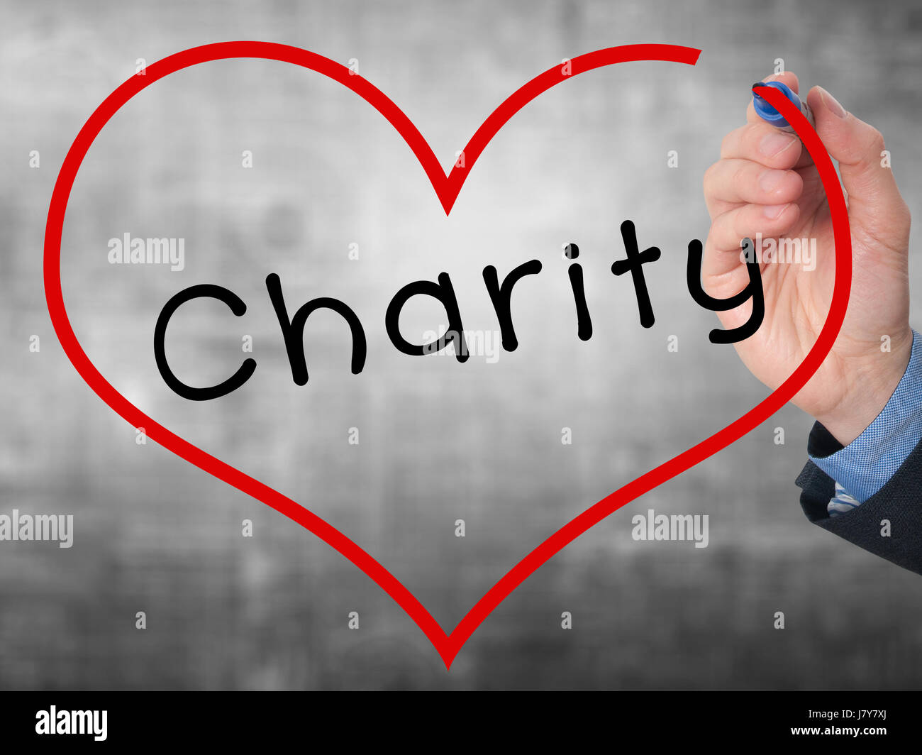 Hand writing Charity inside heart shape. Charity concept. Isolated on ...