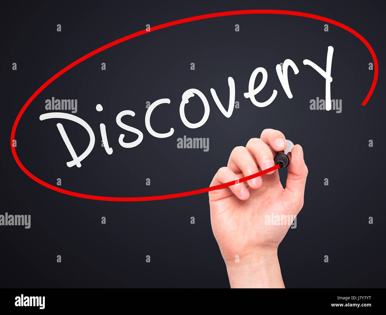 Man Hand writing Discovery with marker on transparent wipe board ...