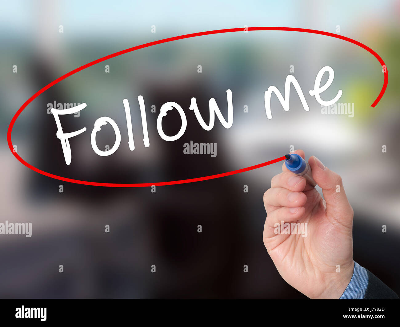 Man Hand writing Follow Me with marker on visual screen. Business ...