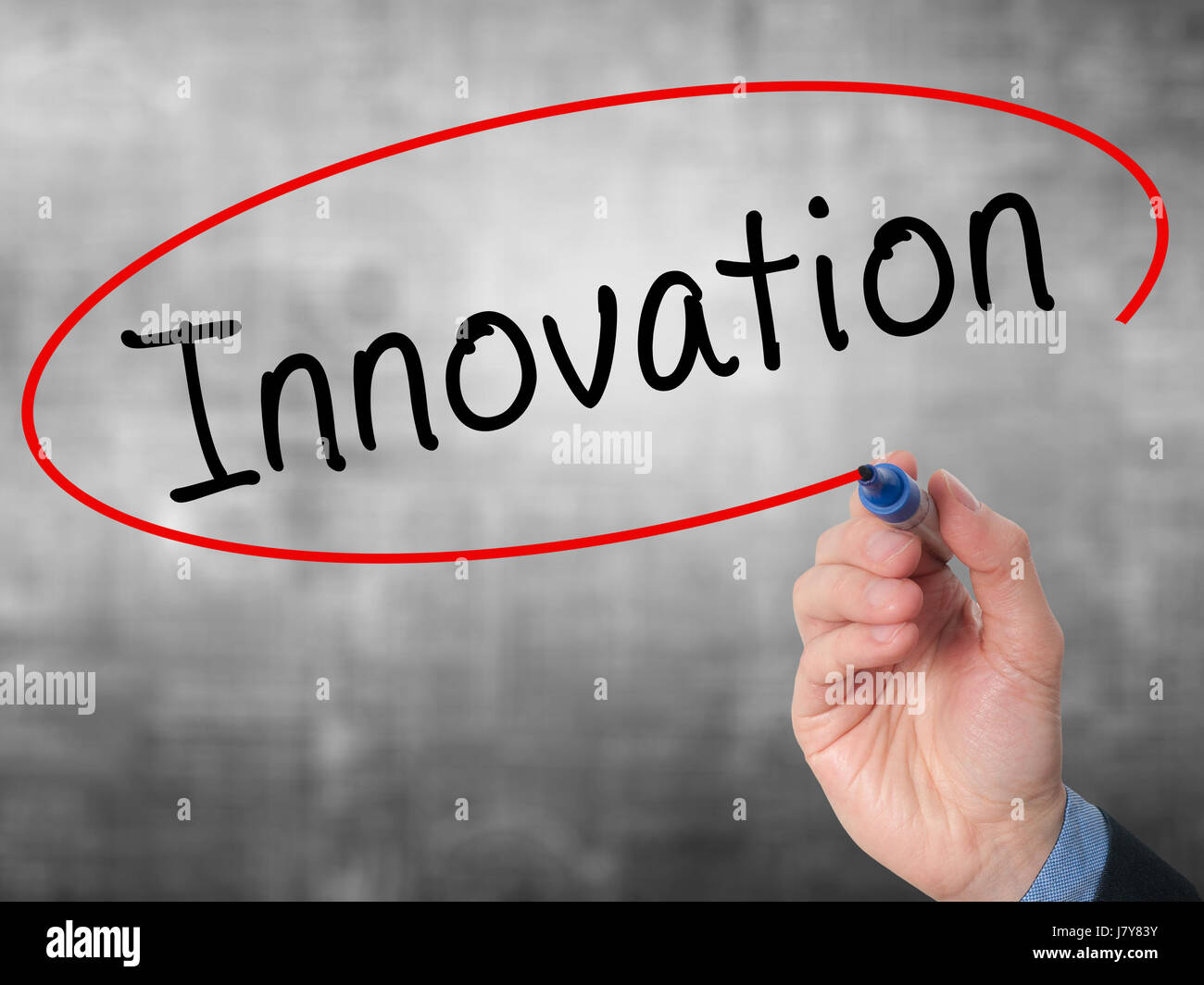 Businessman hand writing innovation in the air. Grey Stock Photo - Alamy Businessman hand writing innovation in the air. Grey Stock Photo - Alamy