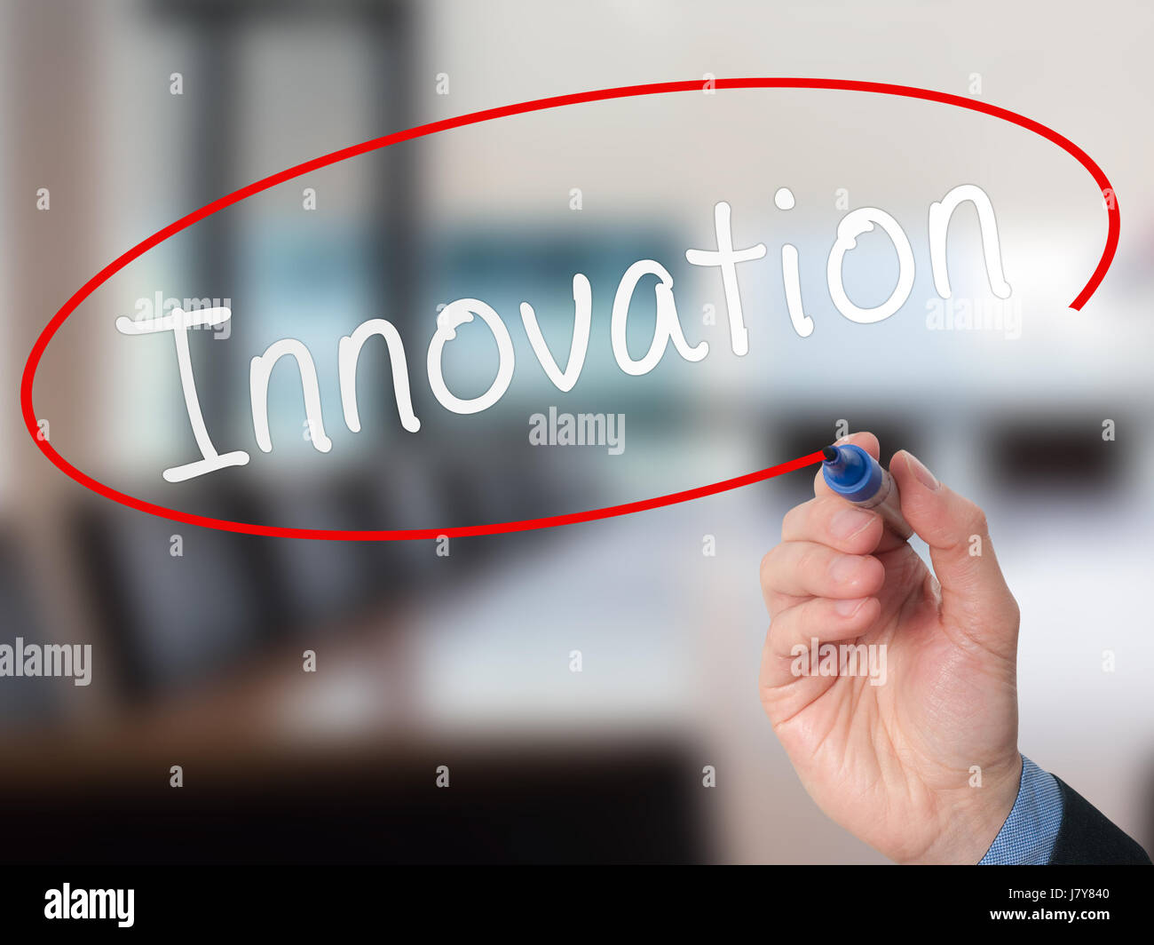 Businessman hand writing innovation in the air. Office Stock Photo - Alamy Businessman hand writing innovation in the air. Office Stock Photo - Alamy