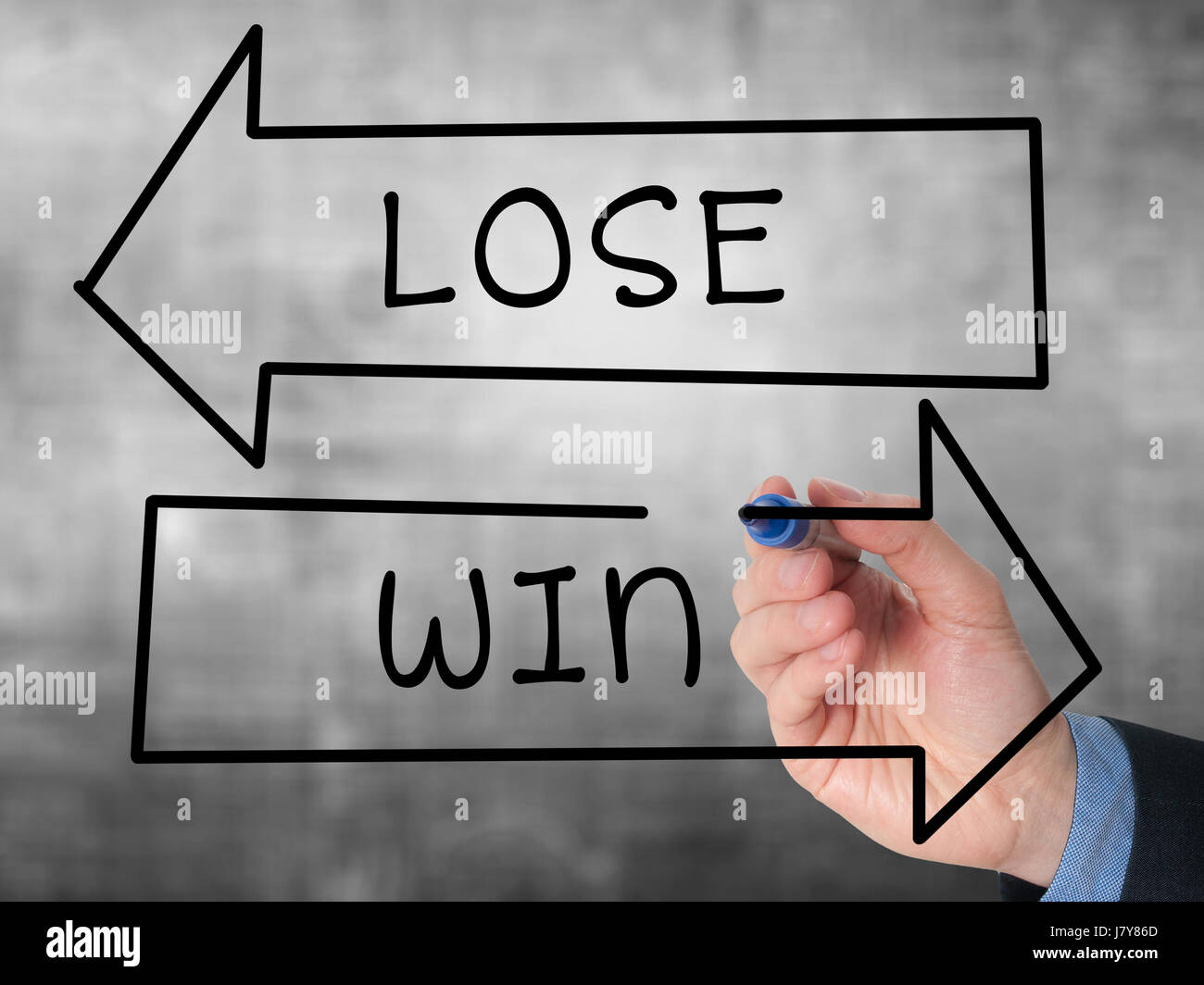 Man Hand drawing Win or Lose concept with white marker on visual screen ...