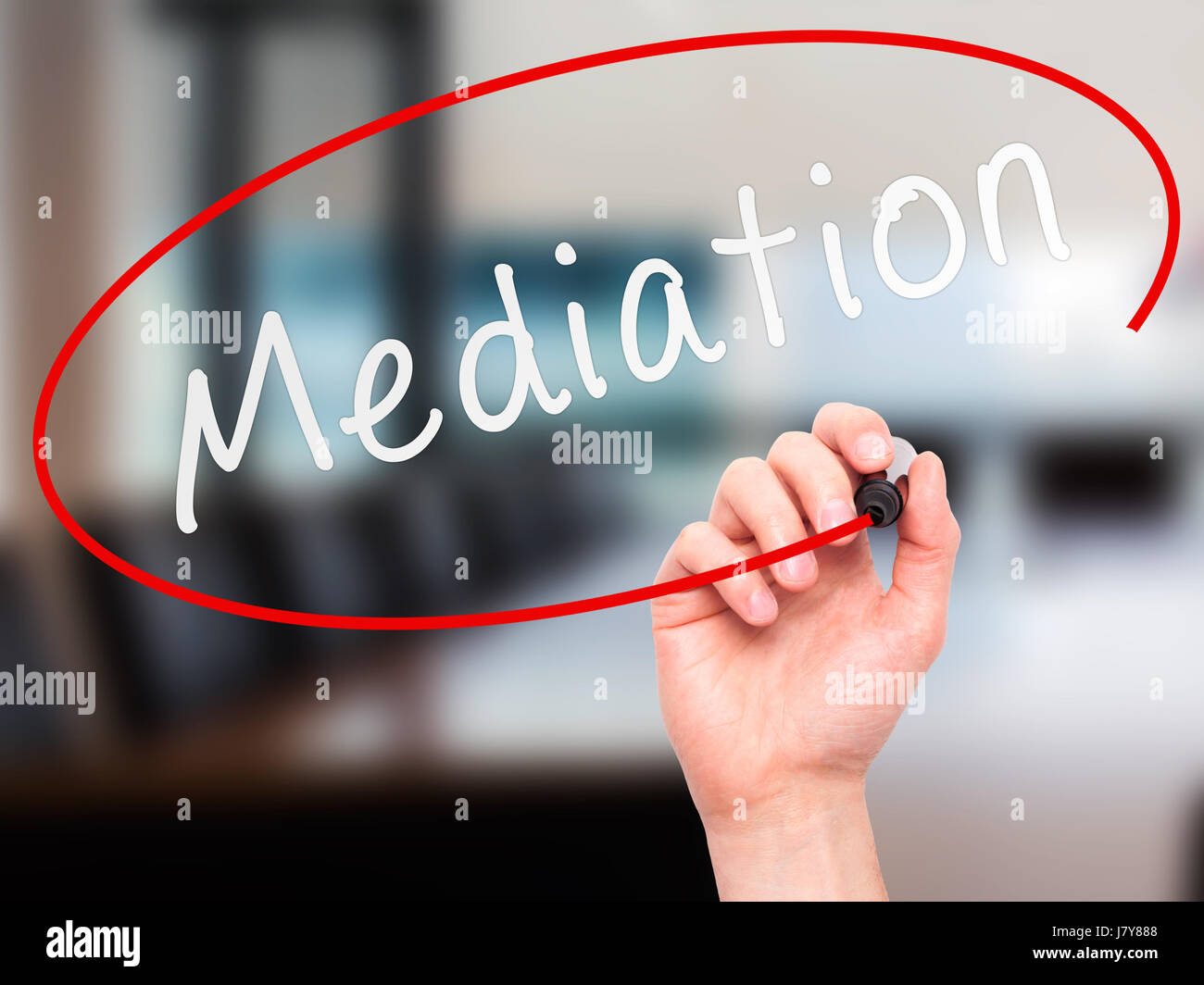 Man Hand writing Mediation with marker on transparent wipe board ...