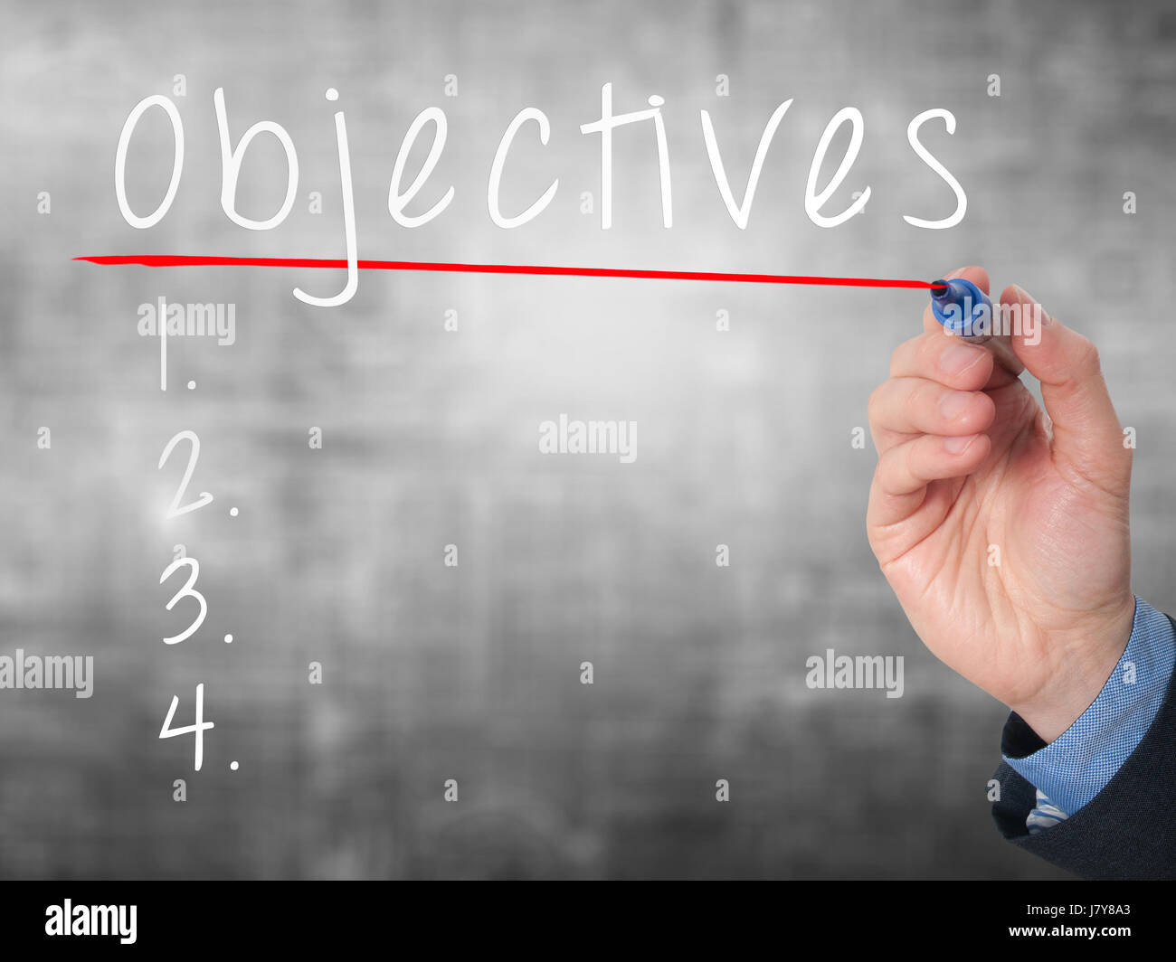 Man Hand writing Objectives to do list with marker. Business, internet ...