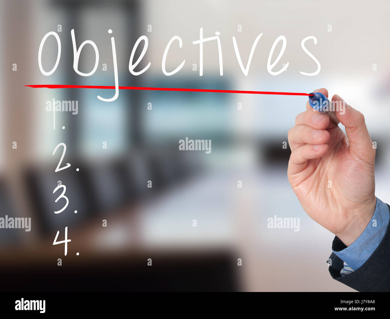 Man Hand writing Objectives to do list with marker. Business, internet ...