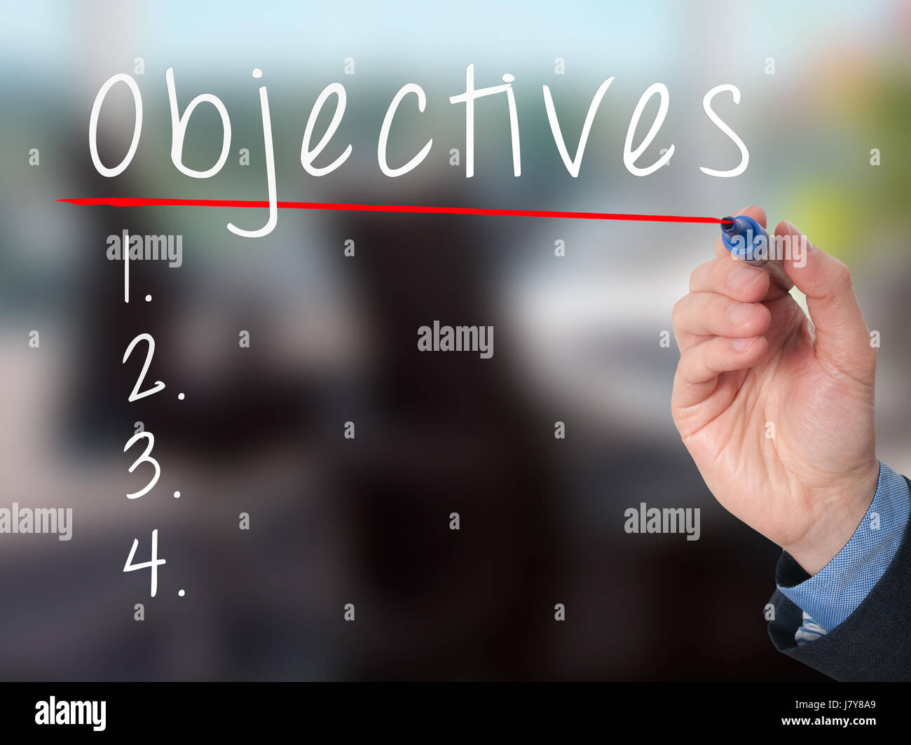 Man Hand writing Objectives to do list with marker. Business, internet ...