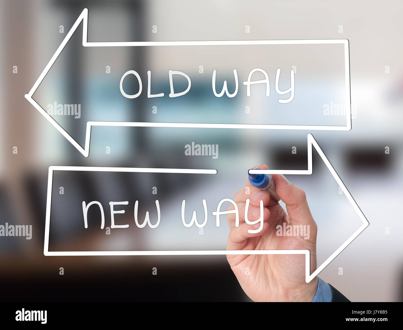 Man Hand drawing Old Way or New Way concept with marker on visual ...