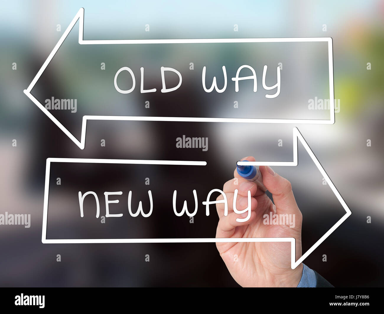 Man Hand drawing Old Way or New Way concept with marker on visual ...