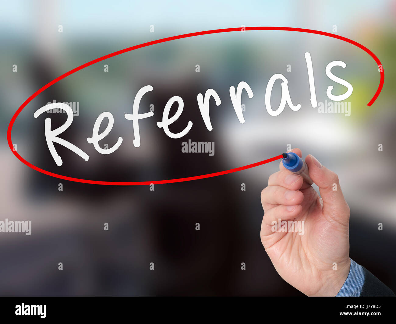Man Hand writing Referrals with marker on virtual screen. Business ...