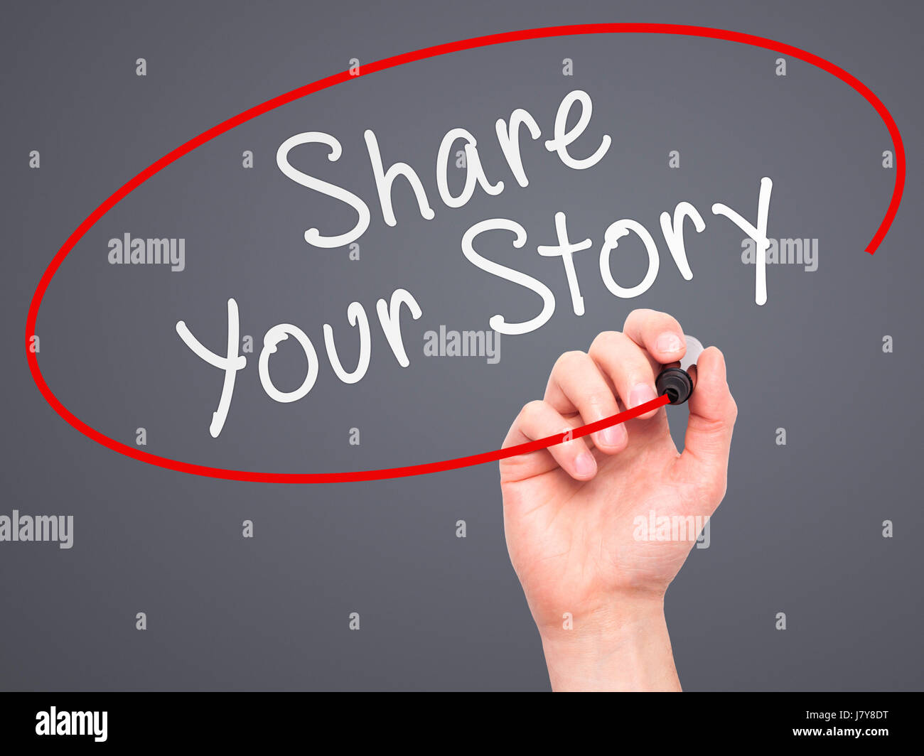 Man Hand writing Share Your Story with marker on transparent wipe board ...