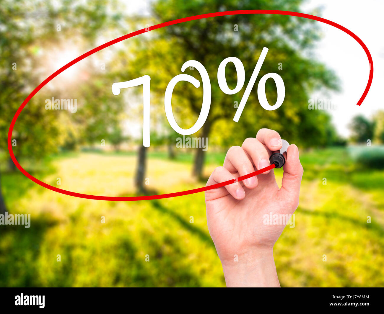 Man Hand writing 70% with black marker on visual screen. Isolated on ...