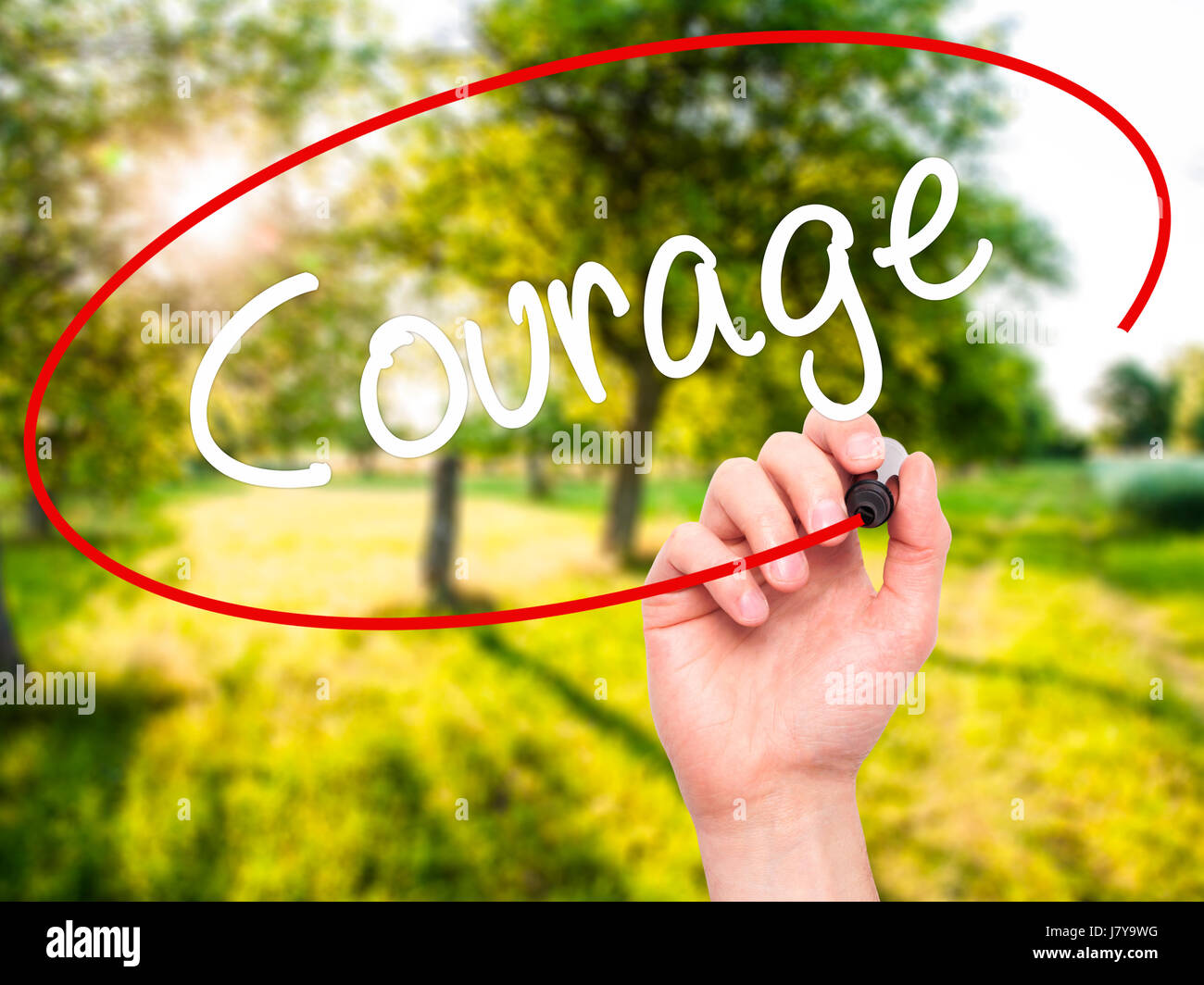 Man Hand writing Courage with black marker on visual screen. Isolated ...