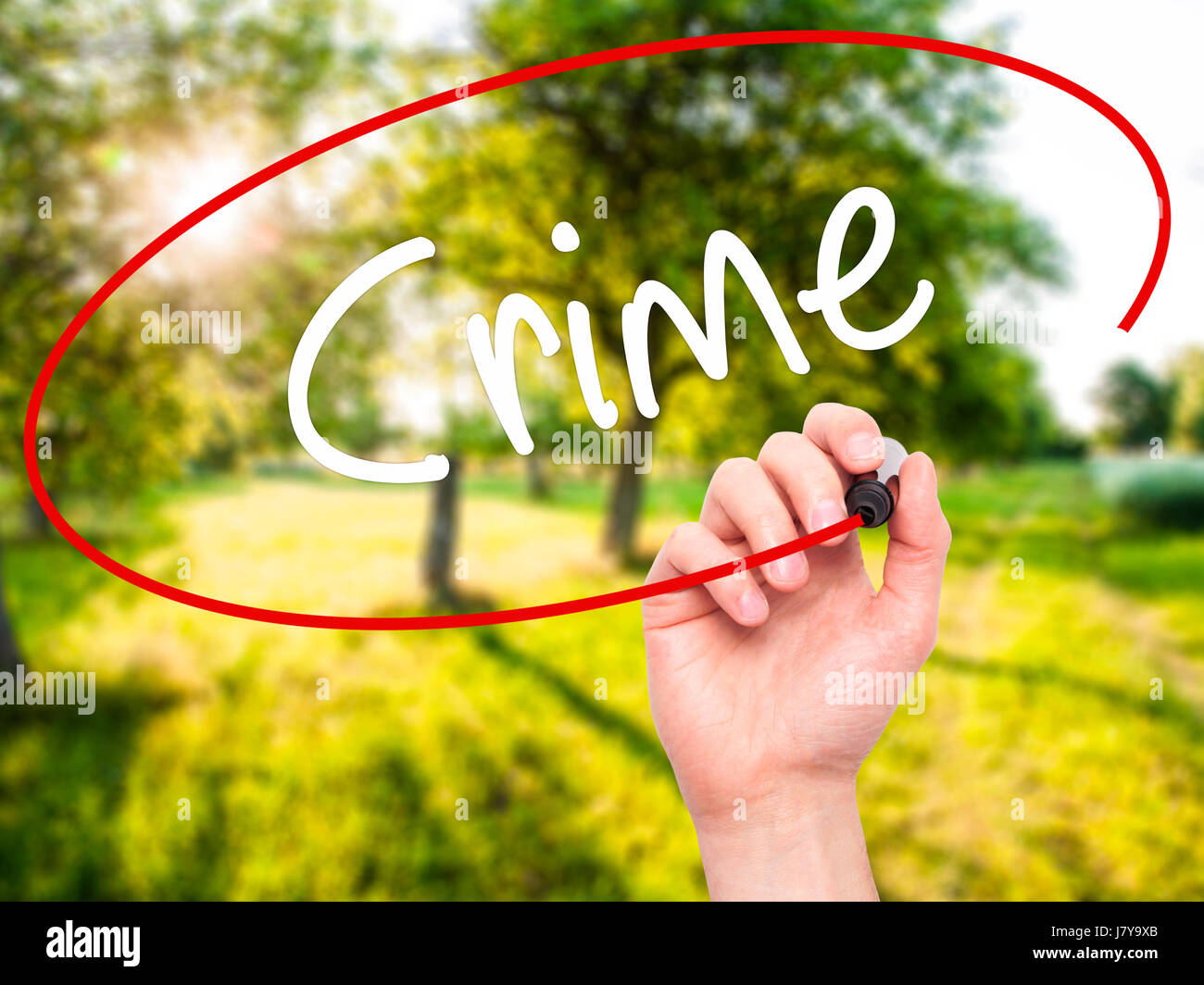 Man Hand writing Crime with black marker on visual screen. Isolated on ...