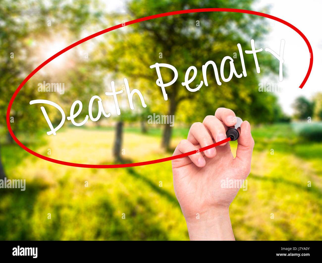 Man Hand writing Death Penalty with black marker on visual screen ...