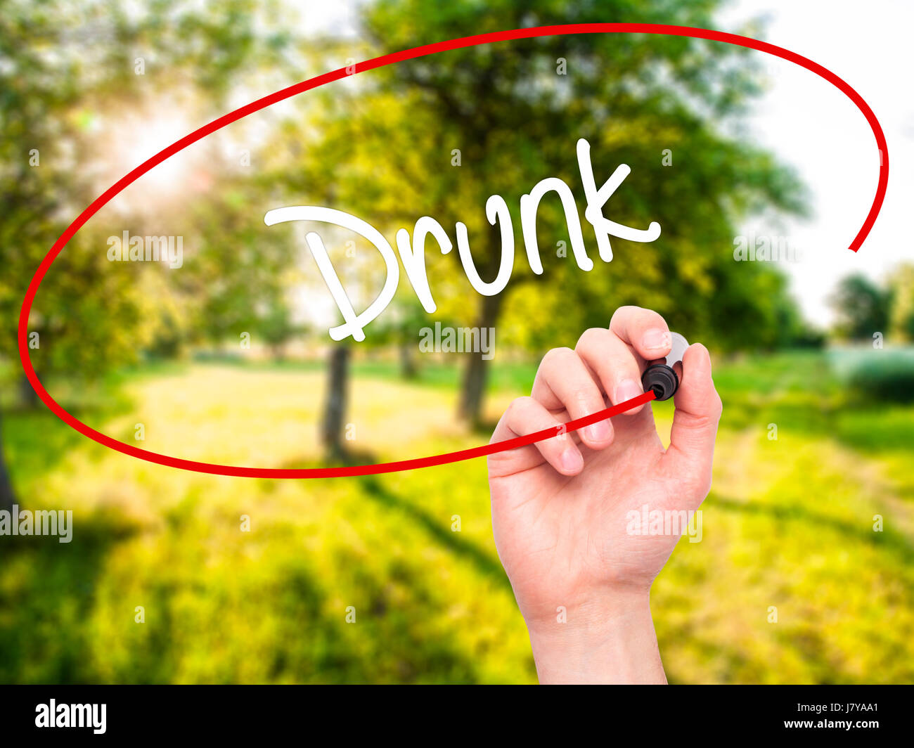 Man Hand writing Drunk with black marker on visual screen. Isolated on ...