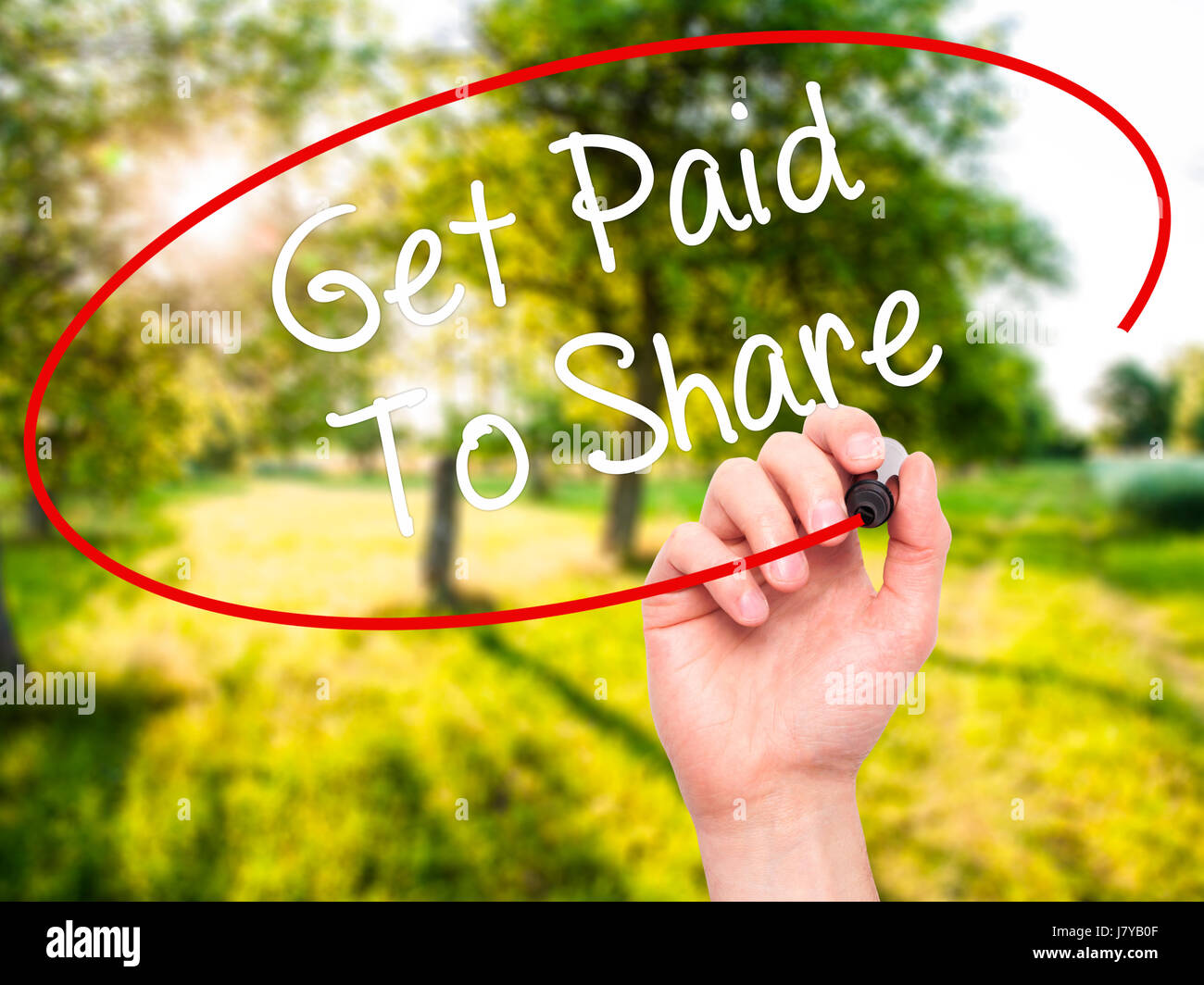 Man Hand writing Get Paid To Share with black marker on visual screen ...