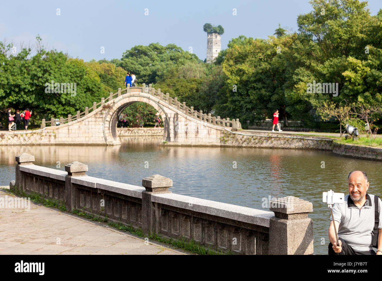 Wenzhou, Zhejiang, China. Jiangxin Island. Chinese Visitor Making a ...