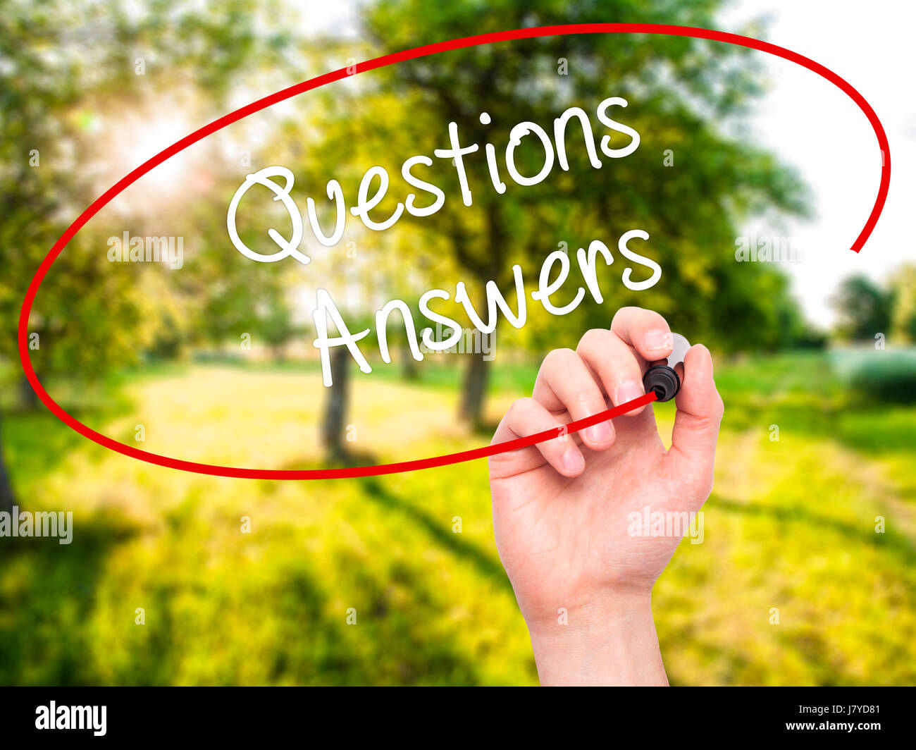 Man Hand writing Questions Answers with black marker on visual screen ...
