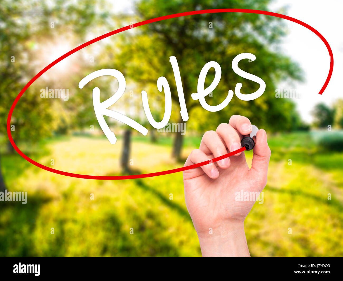 Man Hand writing Rules with black marker on visual screen. Isolated on ...