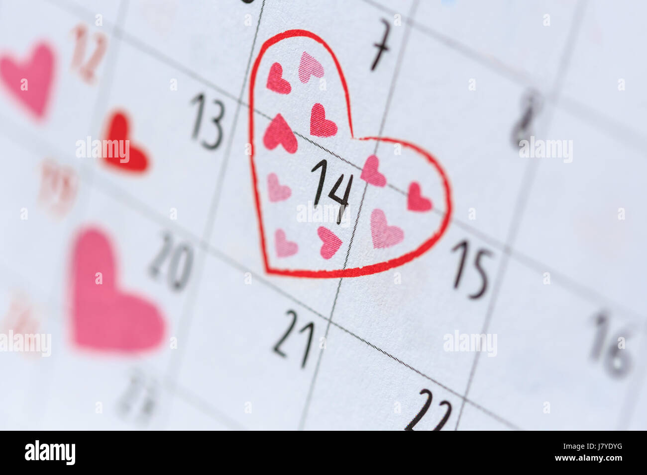 Date 14 in calendar with heart symbol. Valentine day and love concept ...