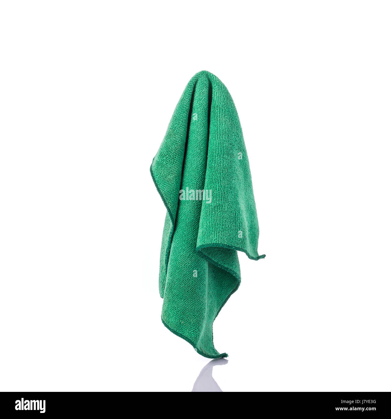 New green microfiber cloth for cleaning. Studio shot isolated on white ...
