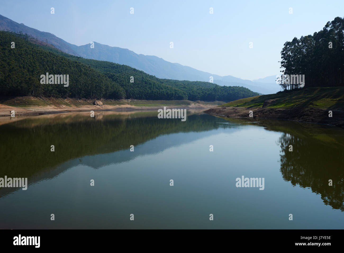 Picturesque mountains and streams of Munnar, Kerala, India are a ...