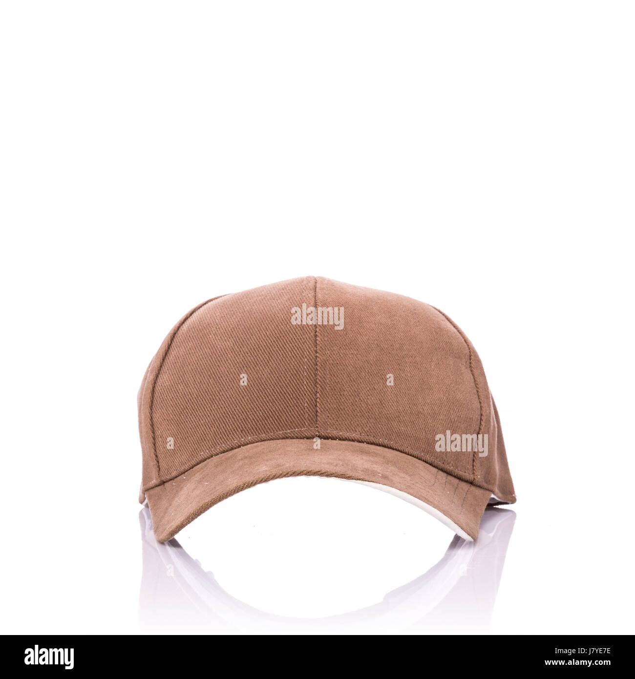 Close up new brown baseball hat. Studio shot isolated on white ...