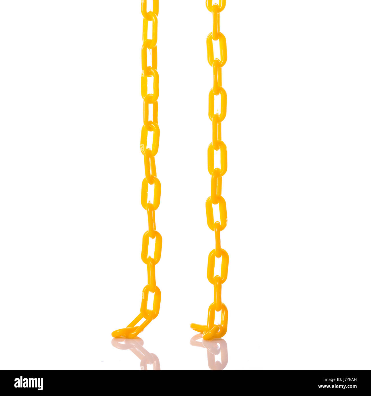 New yellow plastic chain. Studio shot isolated on white background ...