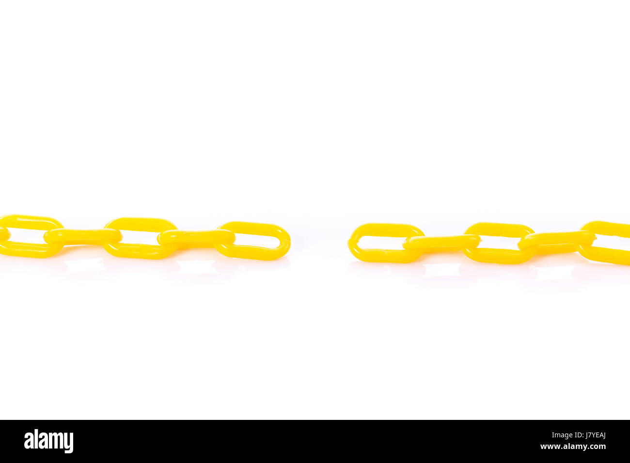 New yellow plastic chain. Studio shot isolated on white background ...
