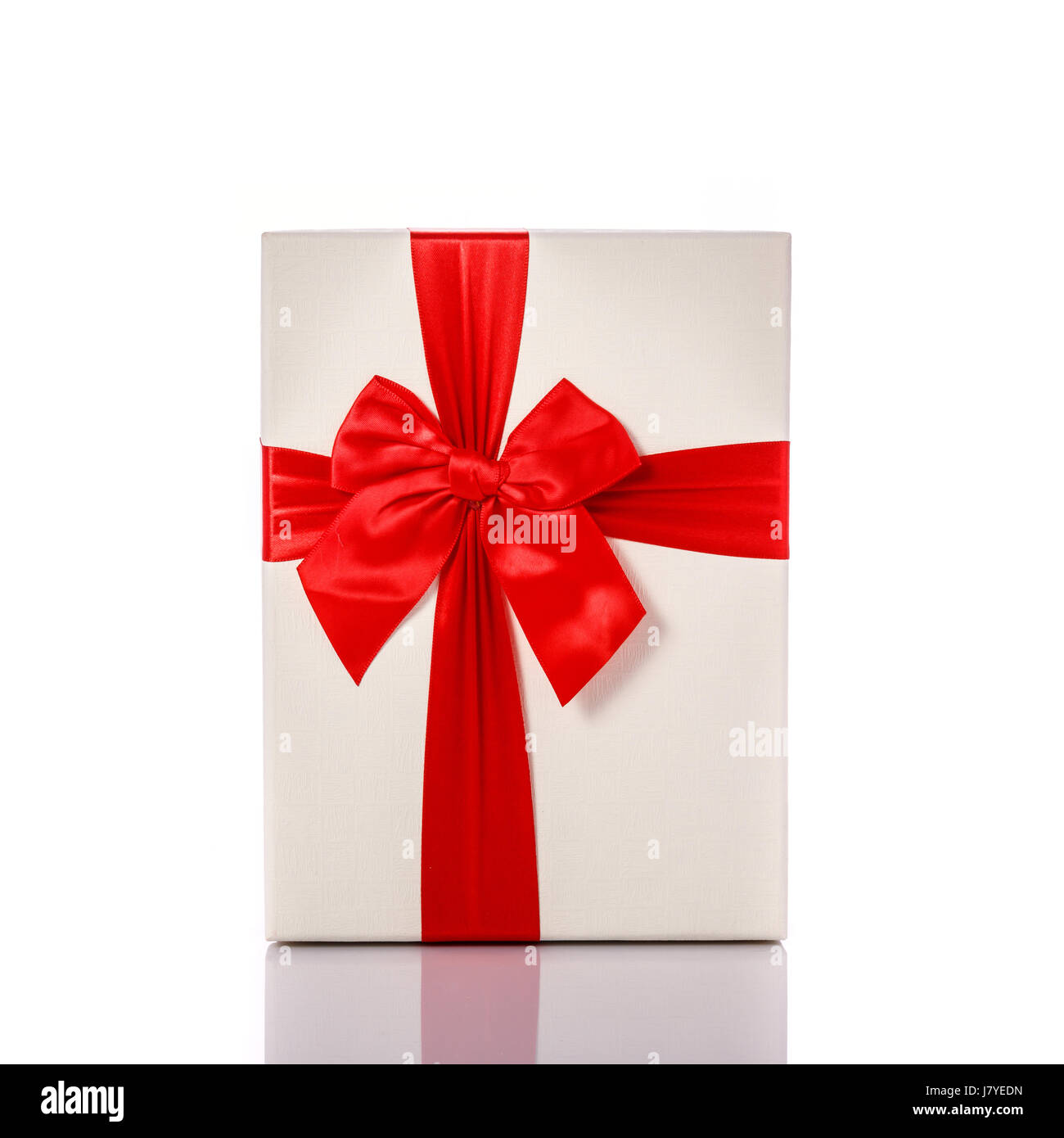New color gift box with ribbon. Studio shot isolated on white ...