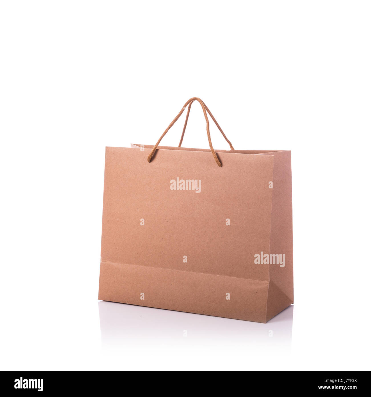Brown paper bag. Studio shot isolated on white background Stock Photo ...