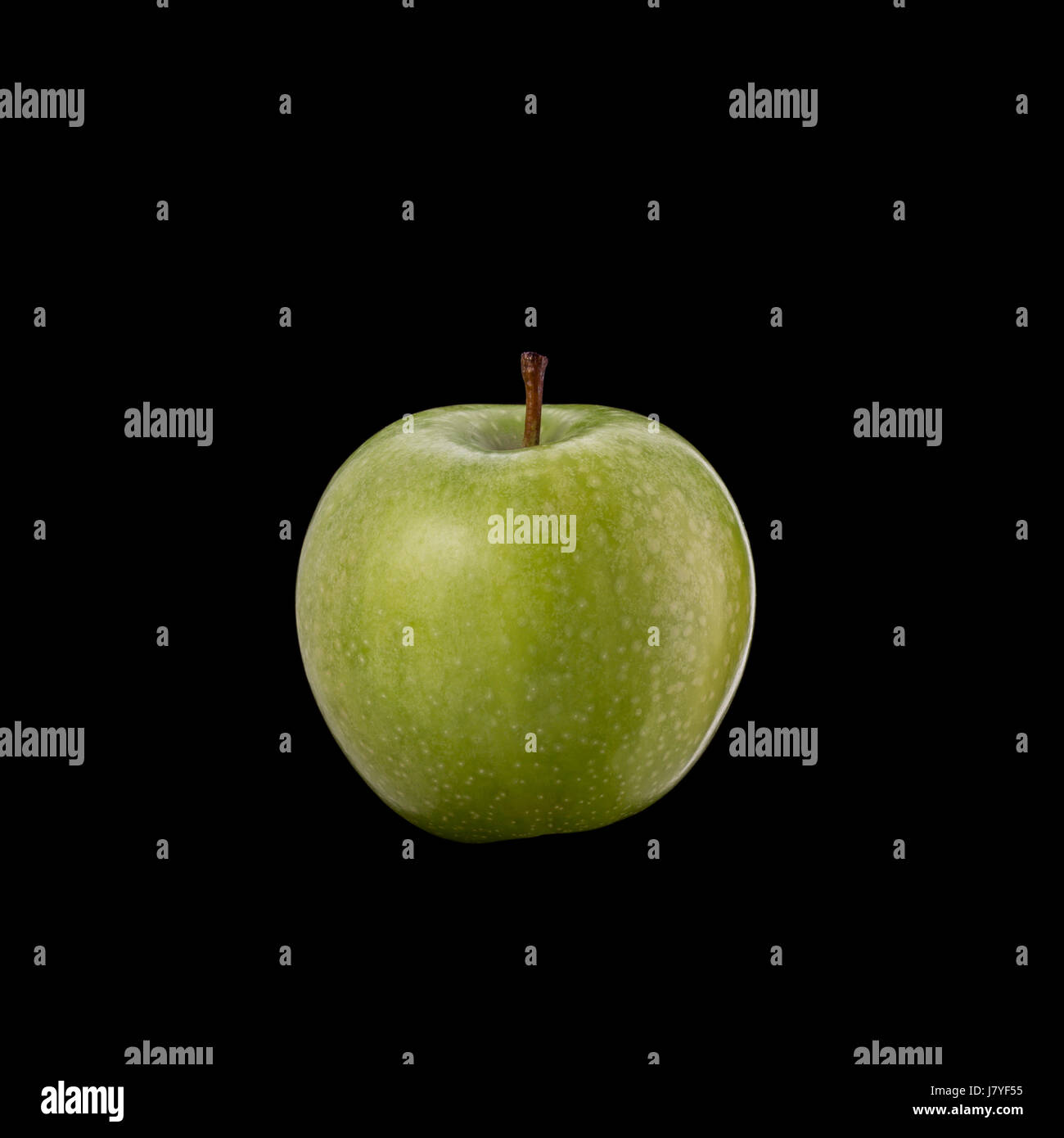 Green apple. Studio shot isolated on black background Stock Photo - Alamy