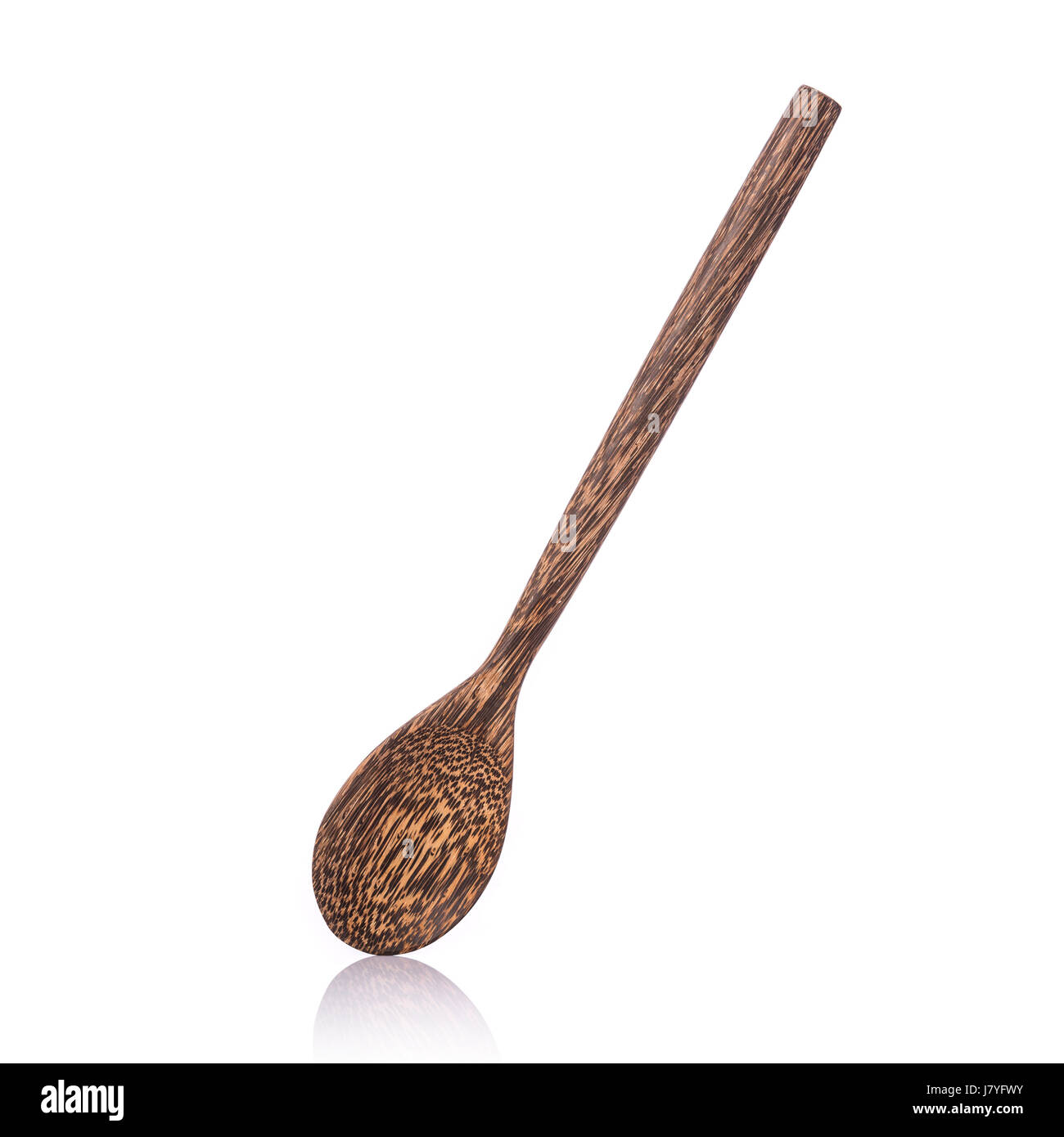 Brown spoon made from palm wood. Studio shot isolated on white ...