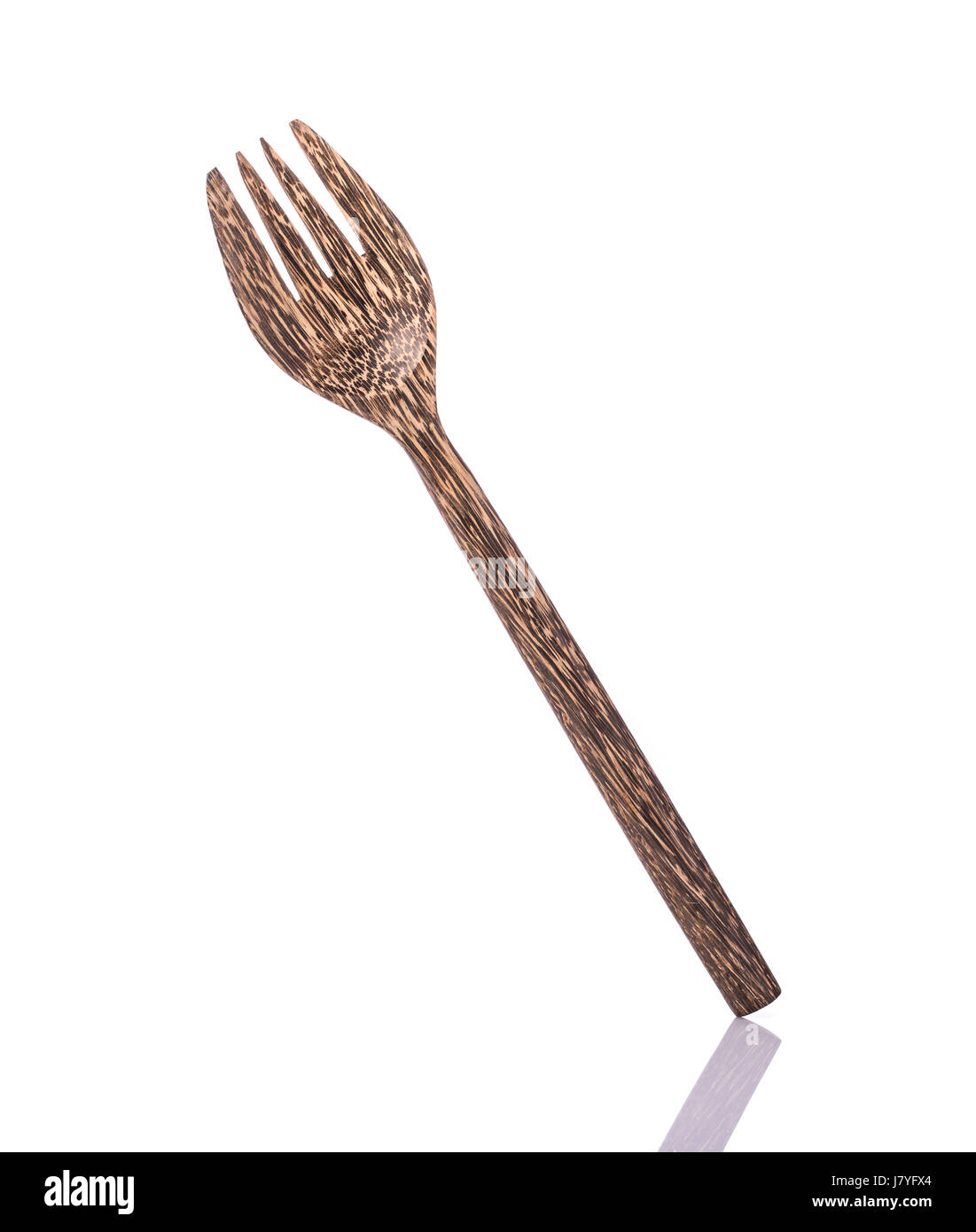 Brown fork made from palm wood. Studio shot isolated on white ...