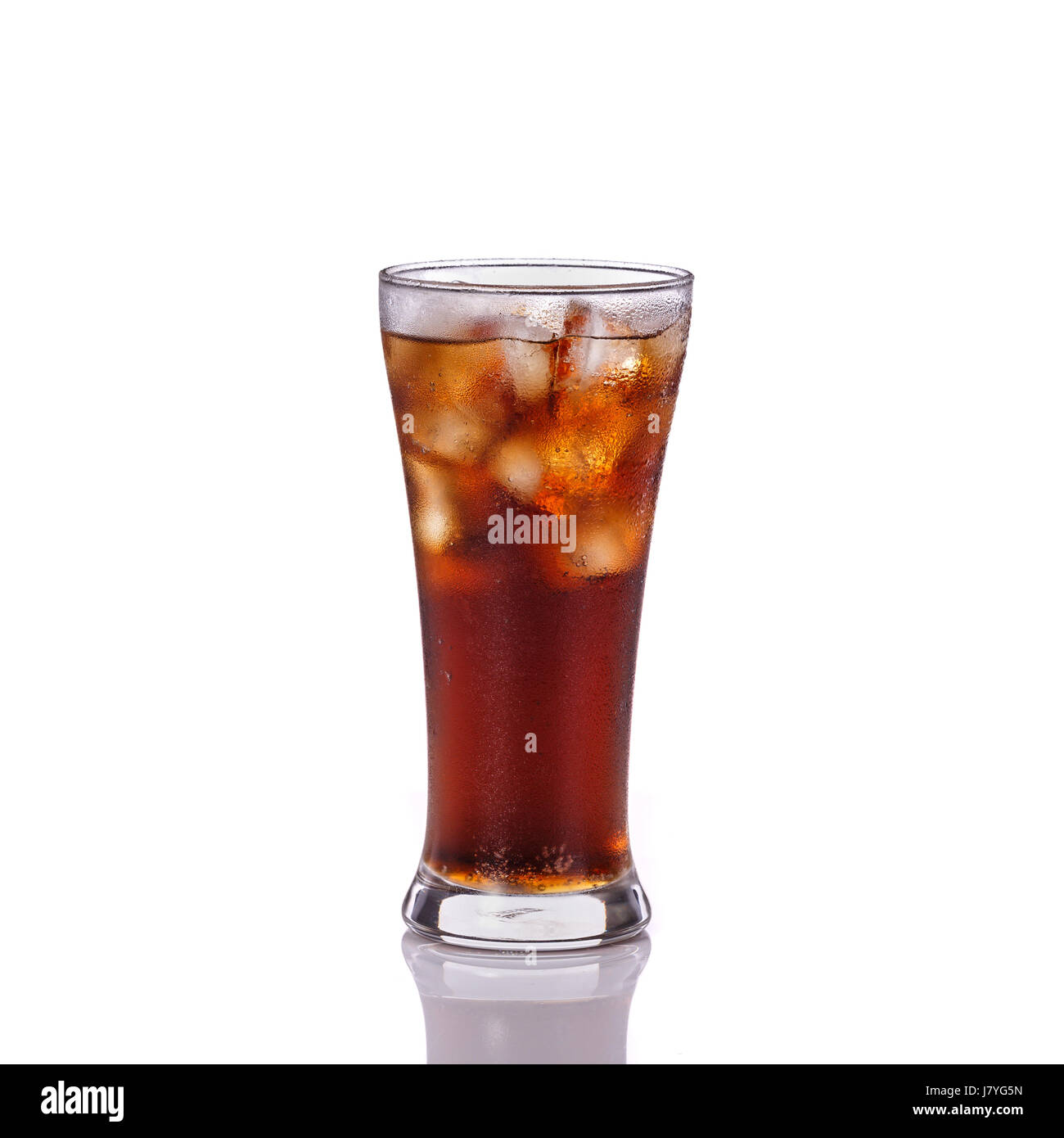Close up glass of soft drink. Studio shot isolated on white background ...