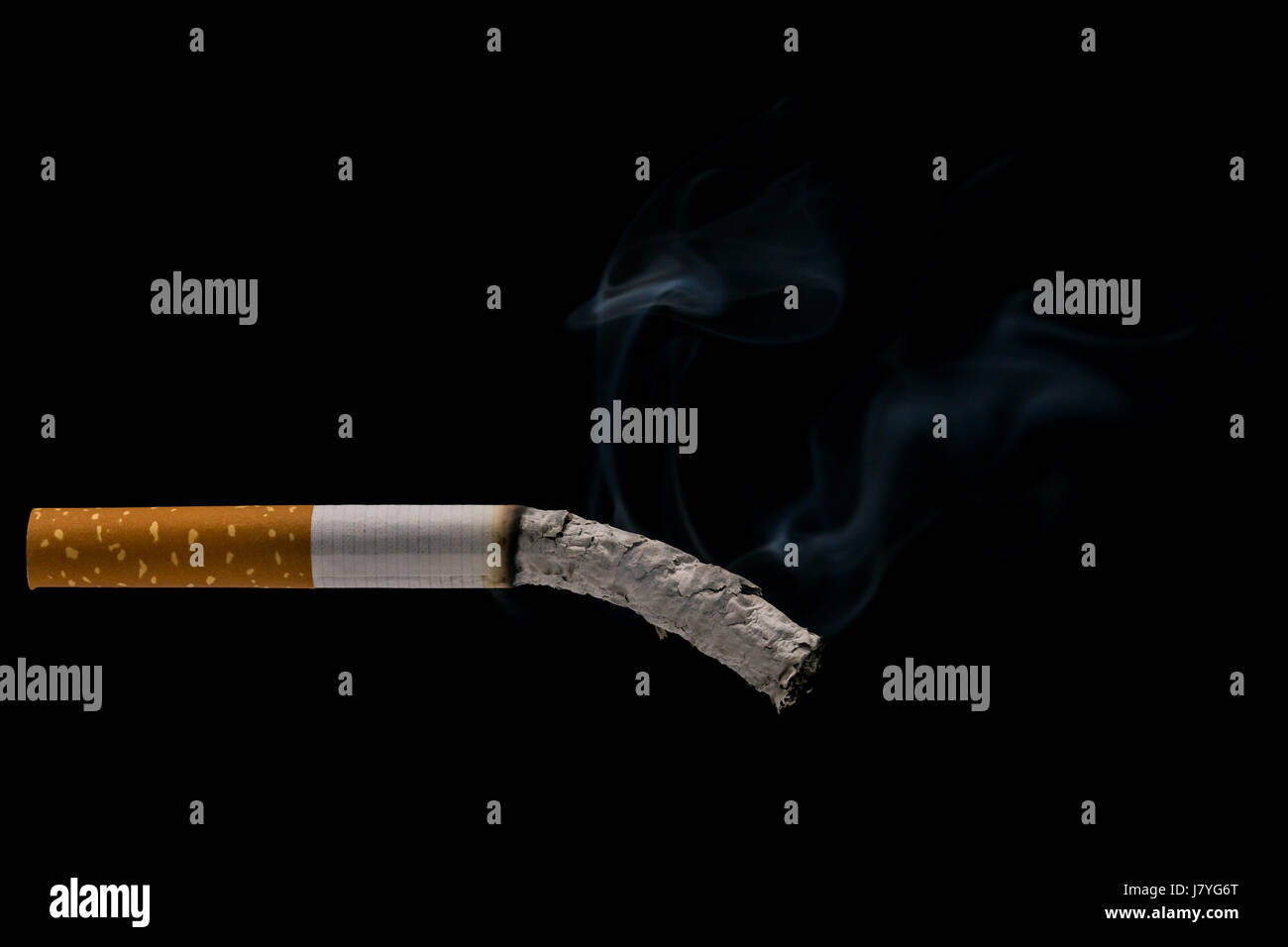 Cigarette. studio shot isolated on a black background Stock Photo - Alamy