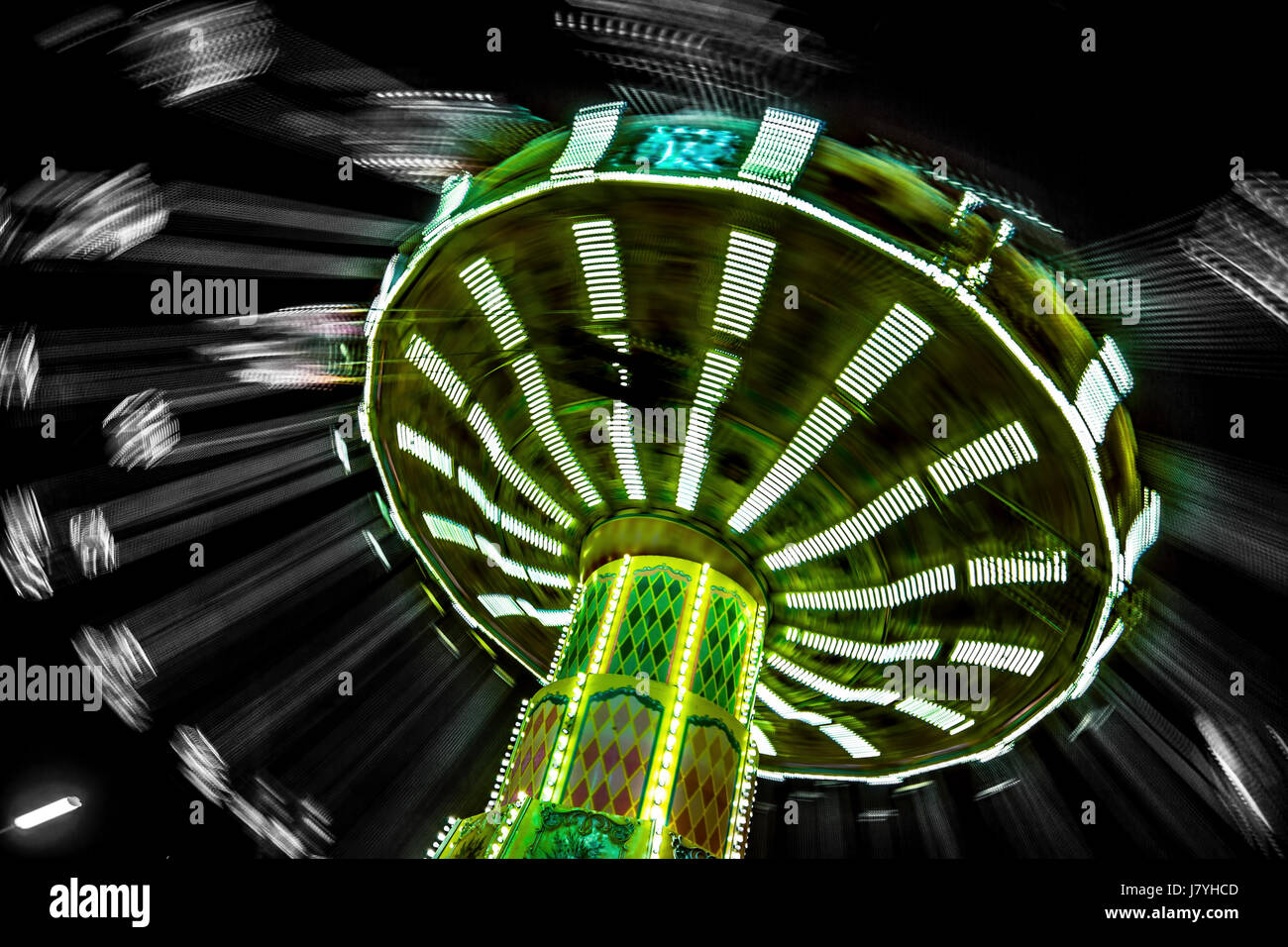 Long exposure shot of the popular Wave Swinger ride, with ghost trails ...