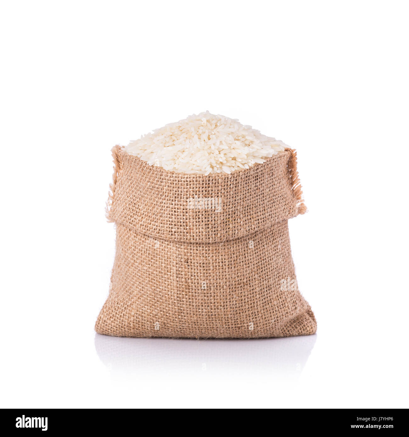 Close up Thai jasmine rice in small sack. Studio shot isolated on white ...