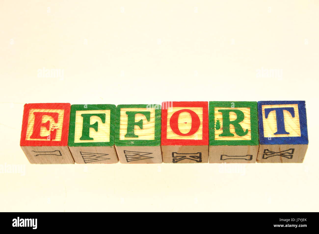 The term effort displayed visually using colorful wooden toy blocks ...