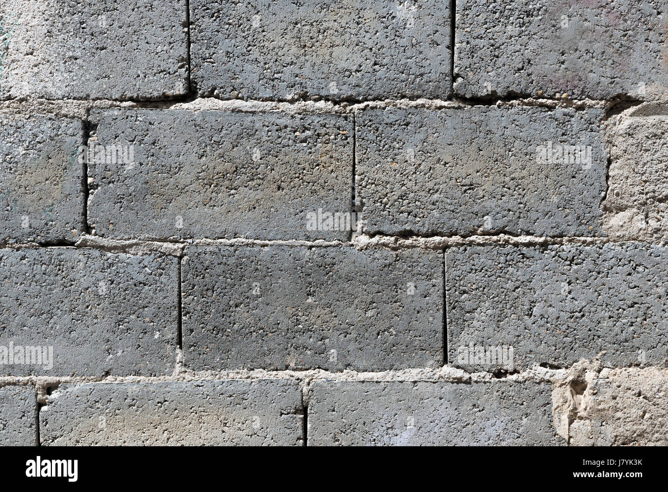 Wall made of prefabricated cement blocks Stock Photo - Alamy