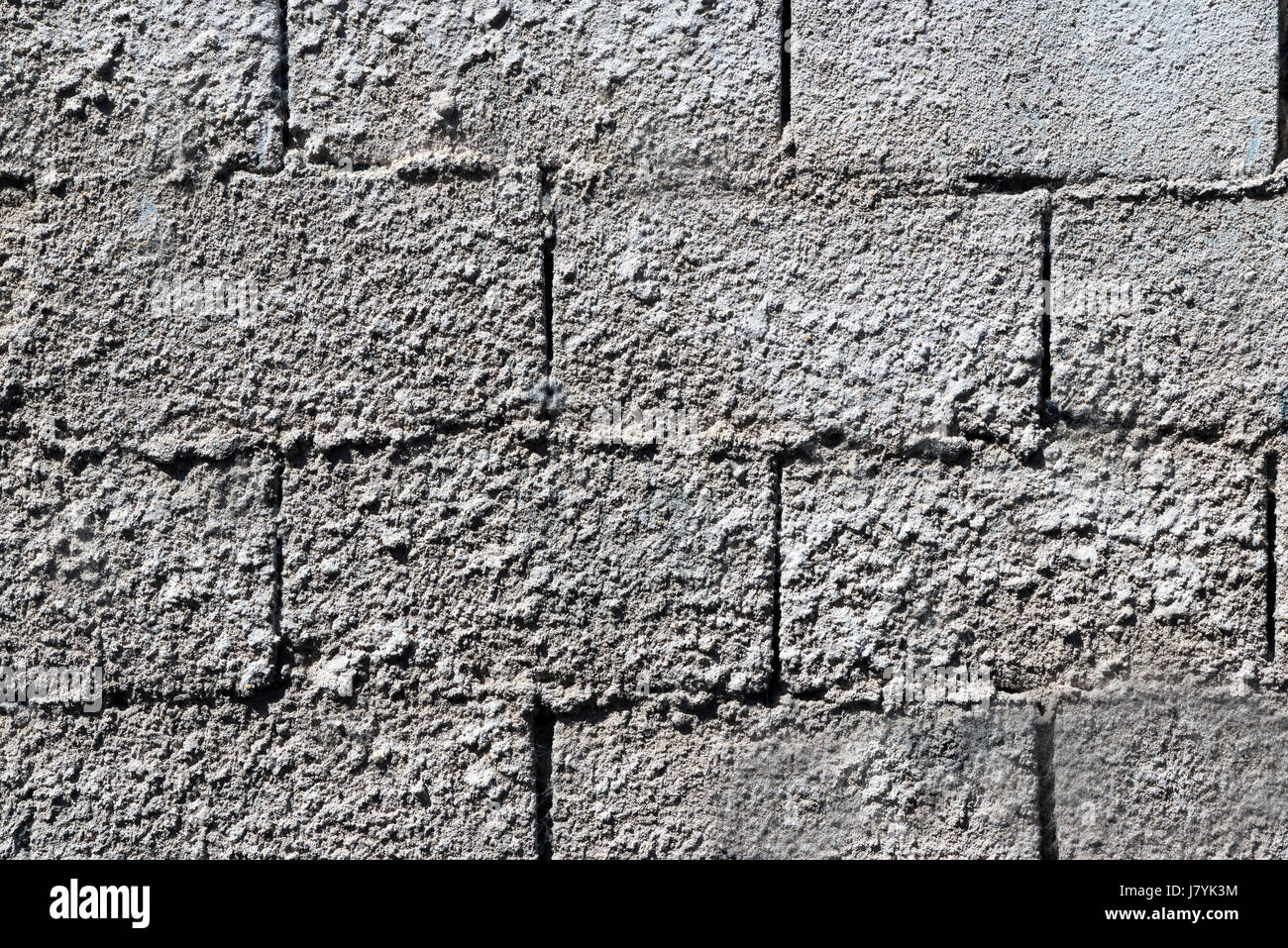 Wall made of prefabricated cement blocks Stock Photo - Alamy