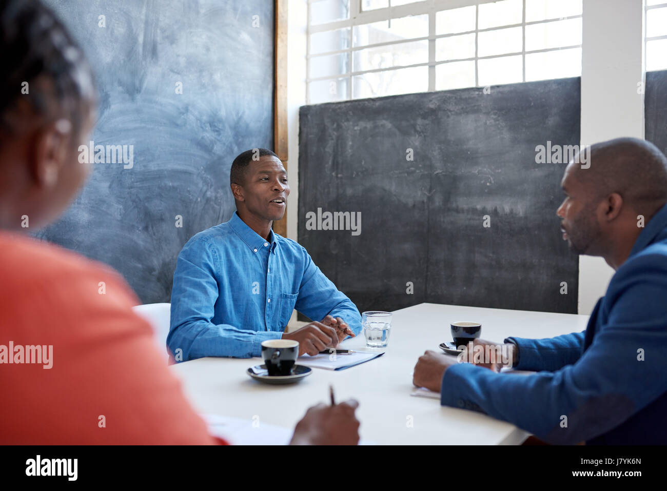 African business professionals having a meeting in an office Stock ...