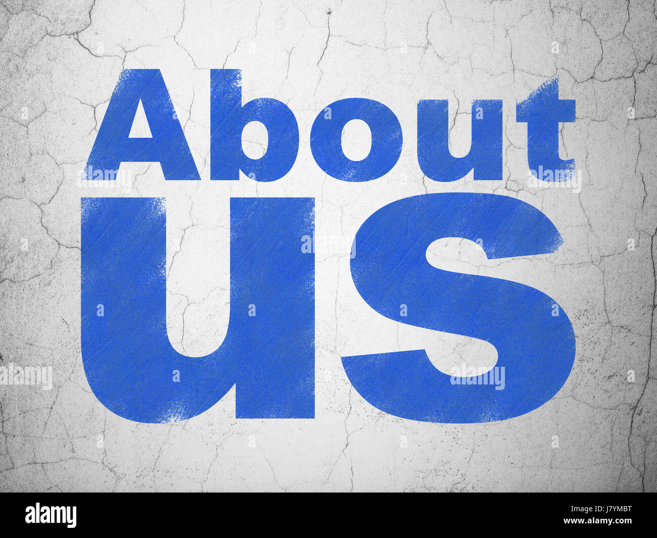 Advertising concept: About Us on wall background Stock Photo - Alamy