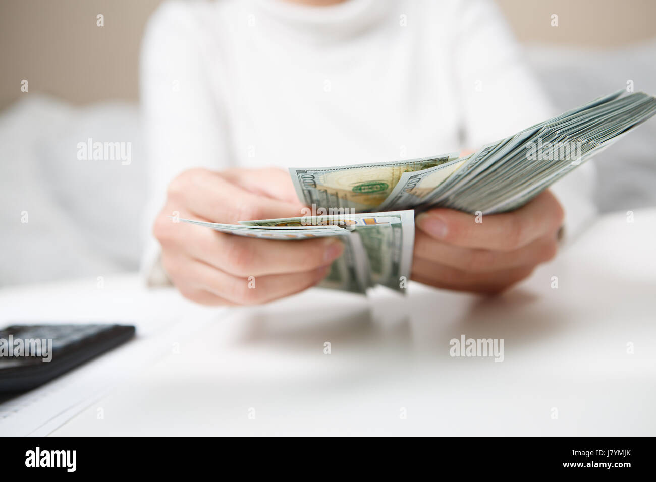 Hands counting money, close up Stock Photo - Alamy